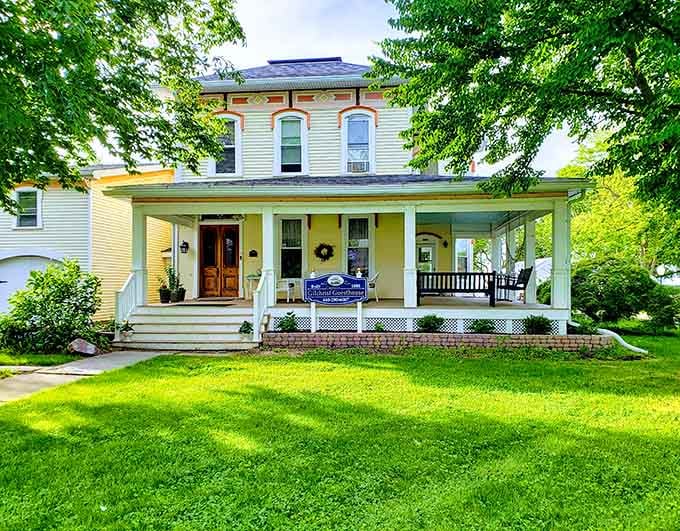 Gilchrist Guesthouse welcomes visitors with yellow walls and a porch that practically begs for morning coffee.