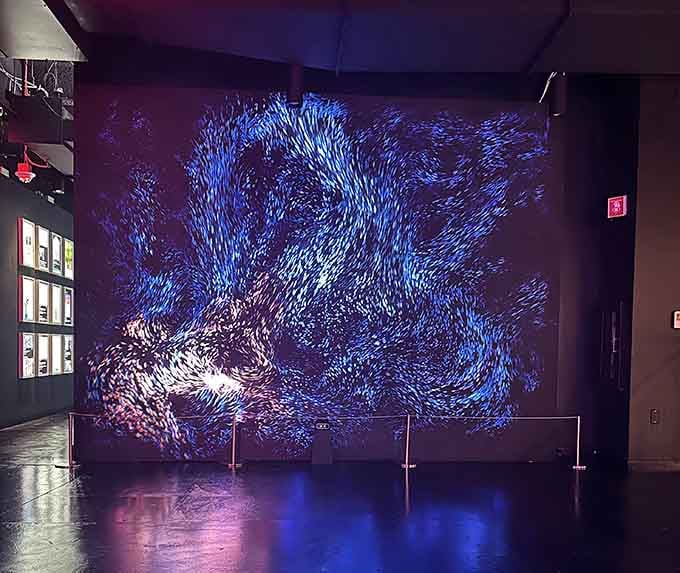 Purple light swirls into mesmerizing patterns, proving that sometimes the best stories are told without words, just pure visual poetry.