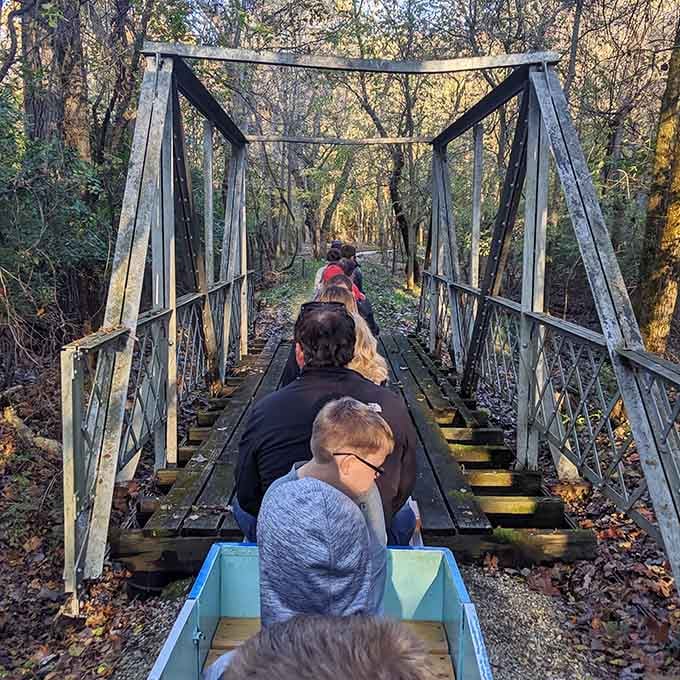 Crossing this truss bridge feels like stepping into a postcard from railroading's golden age, just at a friendlier scale.