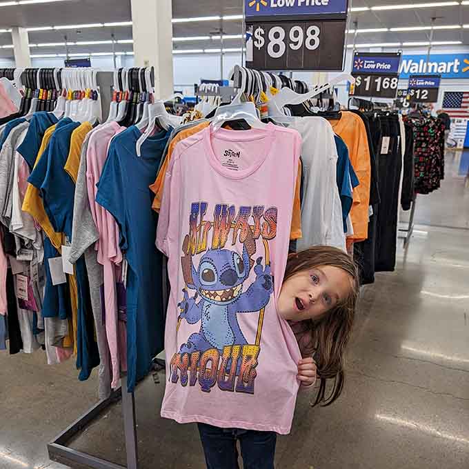 Finding the perfect graphic tee is a universal joy that transcends age, as this enthusiastic shopper demonstrates.