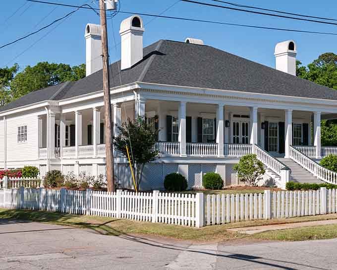White picket fences and wraparound porches define residential charm that Andy Griffith would have felt right at home visiting.