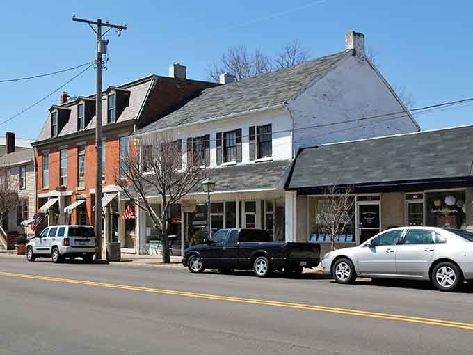 The Butter Churn Cafe's cheerful yellow door practically begs you to come inside for hand-dipped ice cream and nostalgia.