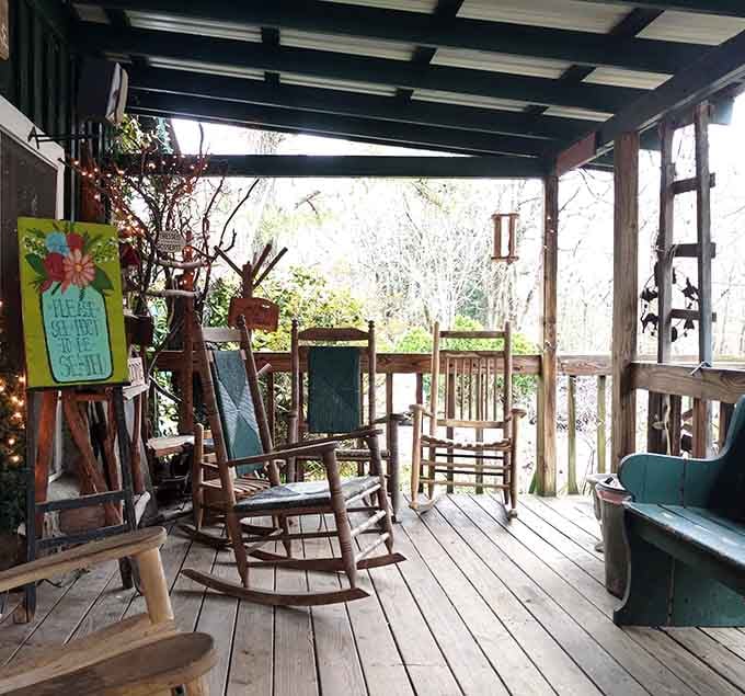 The front porch with rocking chairs beckons you to sit a spell before or after your enchanted meal.