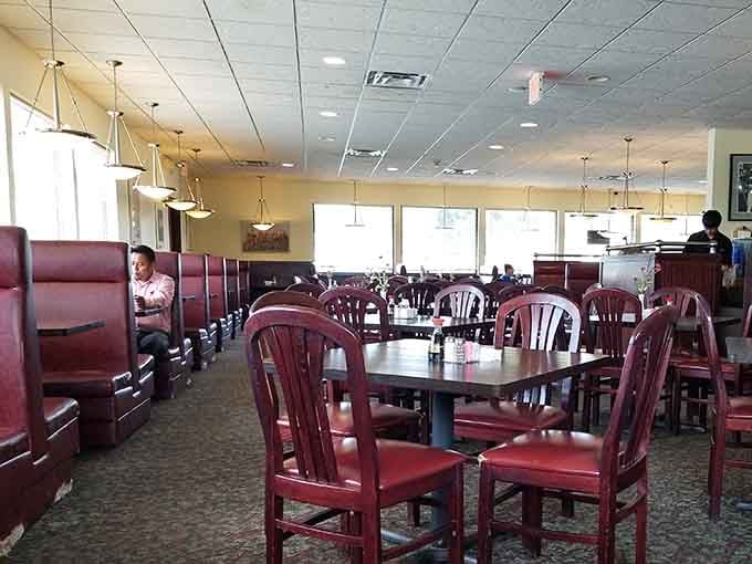 Natural light floods the dining area where families gather to celebrate the joy of unlimited second helpings.