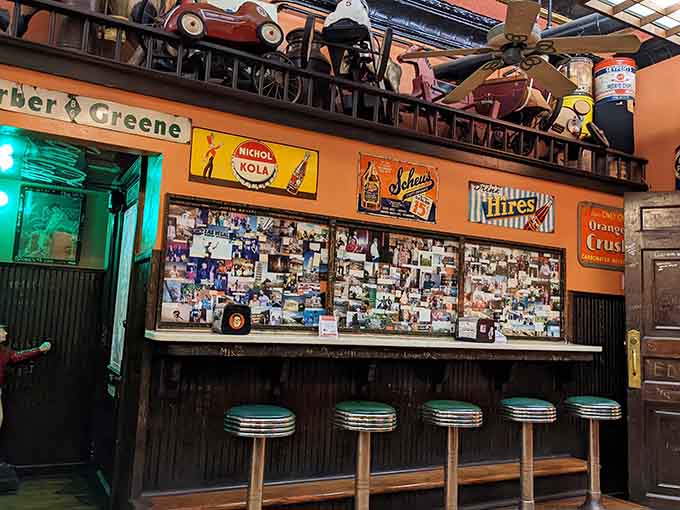 Classic diner stools lined up like soldiers ready to serve hot dog enthusiasts with vintage flair.