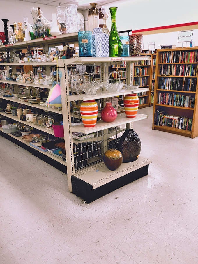 Colorful vases and glassware catch the light like a rainbow exploded in the housewares aisle.