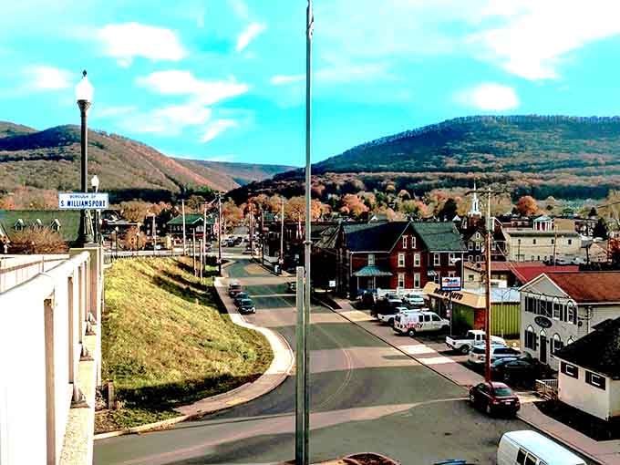 Mountains frame this valley town where colorful houses climb hillsides like they're racing to get the best view.