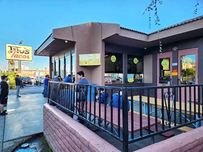The outdoor patio fills with families and taco enthusiasts who've been coming here since their own childhood days.