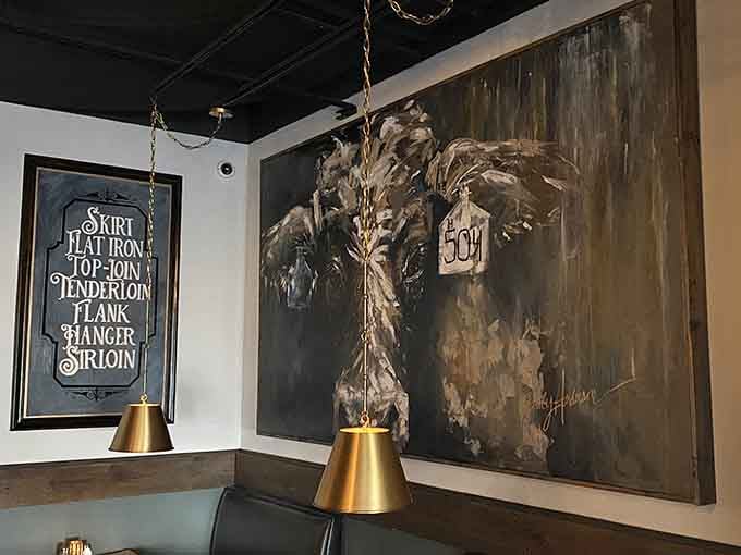 Artistic touches like that cow painting remind you exactly what this establishment does best without saying a word.