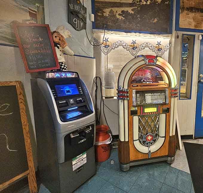 A vintage jukebox and ATM side by side&mdash;because great breakfast requires both good music and accessible cash always.