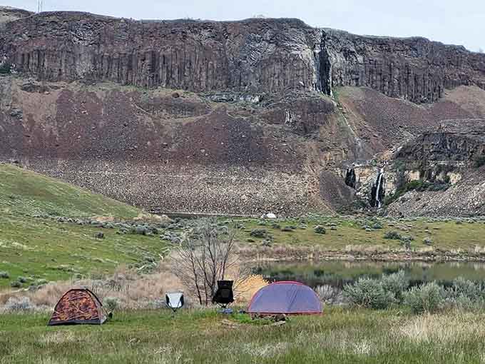Camping beneath these cliffs means waking up to views that make your tent feel like a five-star resort.