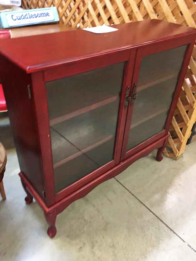 A bright red cabinet that's either perfect for your kitchen or the boldest statement piece your living room never knew it needed.