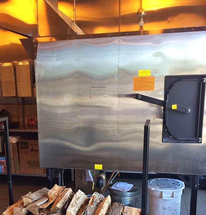 The heart of the operation: where patience, smoke, and time transform ordinary cuts into extraordinary experiences every single day.