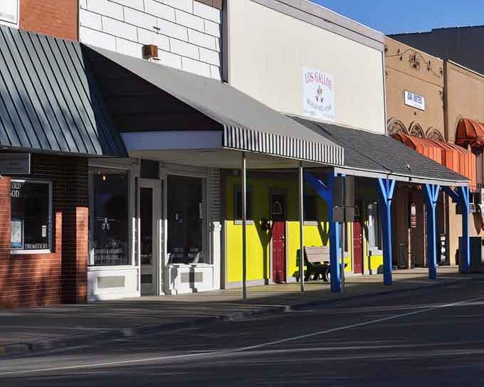 Colorful storefronts house unique shops where browsing becomes an adventure and every purchase supports local artisans and families.