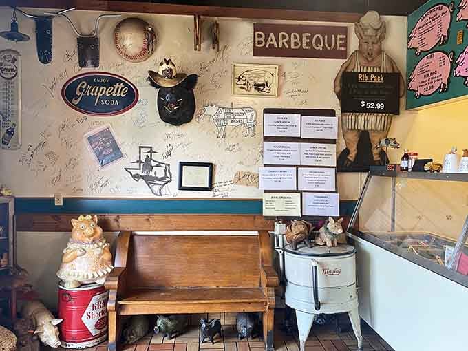 The waiting area promises that good things come to those who wait, especially when those things are smoked meats.