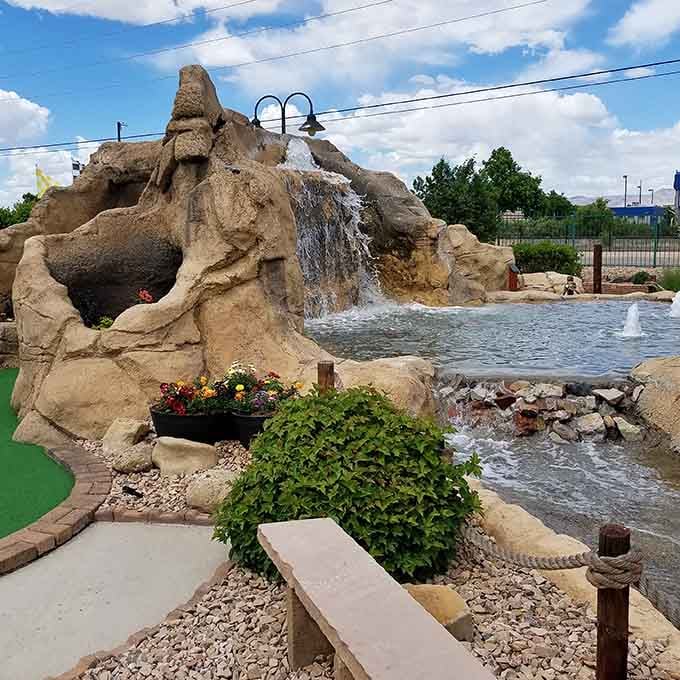 This rock waterfall brings a touch of natural beauty to the mini golf course, minus the actual hiking required.