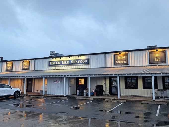 The parking lot at dusk signals another successful day of serving hungry customers craving fresh seafood by the water's edge.