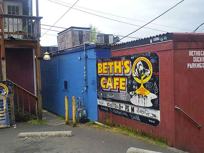 Even the parking area gets the colorful Beth's Cafe treatment with murals that brighten up Aurora Avenue.