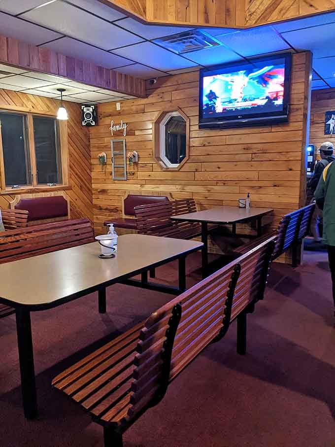 Wood-paneled dining space with comfortable seating where families gather and friends reconnect over generous portions and good conversation.
