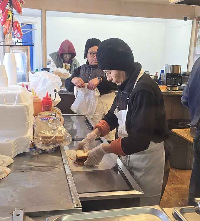 Hands that have wrapped thousands of meals, each one made with the same care.