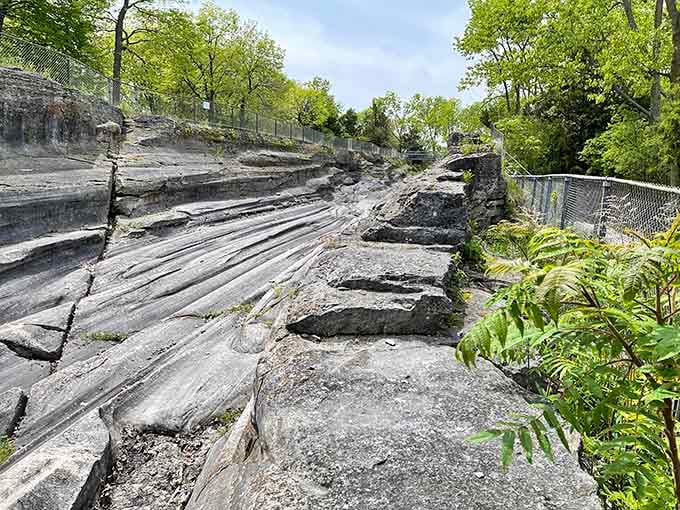 The exposed rock layers tell a geological story spanning millions of years, written in stone and sediment.