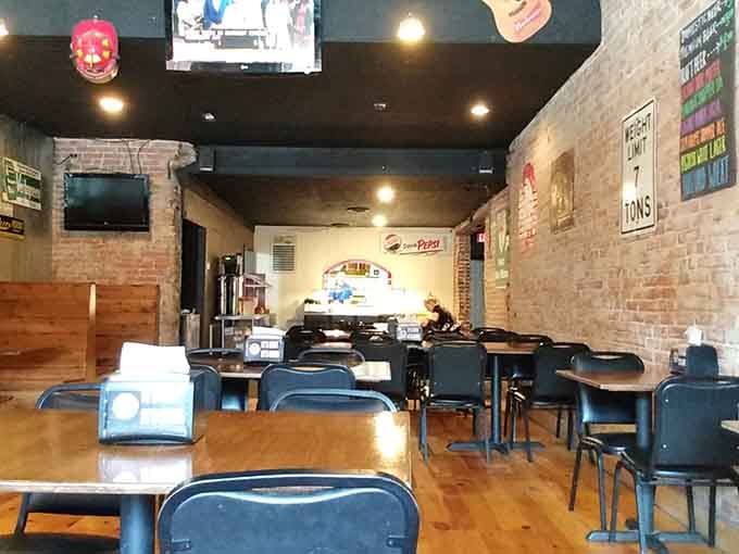 Pigskin Pub & Pizza's interior offers comfortable dining where servers remember your name, not your number.