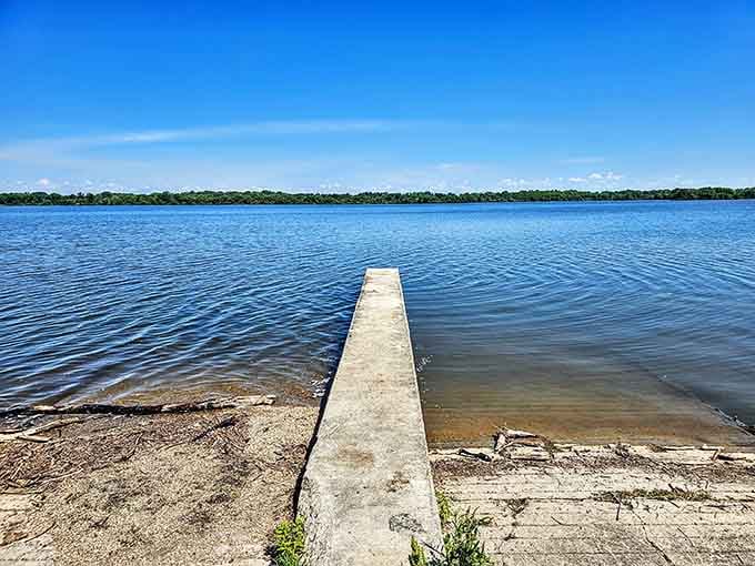 Boat ramps and docks stretching into water so blue, it looks like someone adjusted the saturation settings.