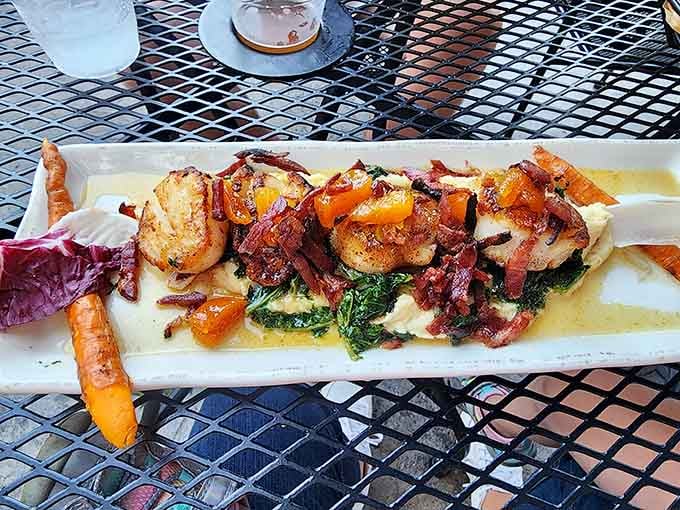 Scallops arranged like edible art, proving seafood can be beautiful and delicious at once.