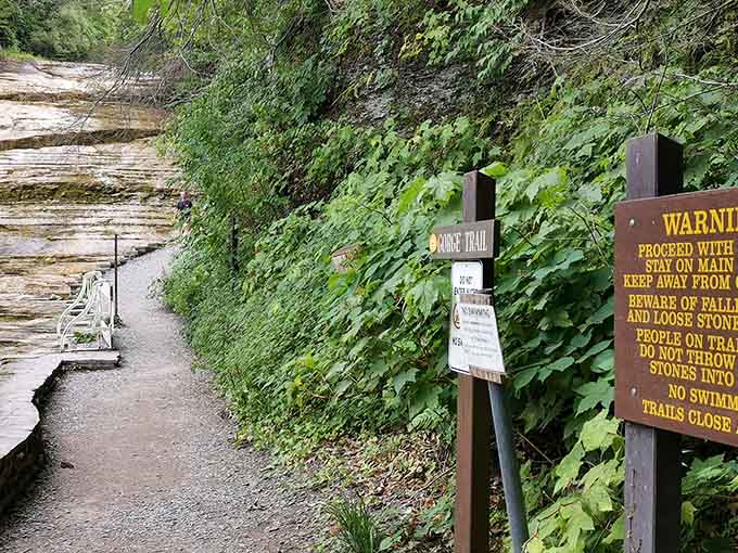 Trail signs point the way through the gorge, because even paradise needs a little wayfinding help occasionally.
