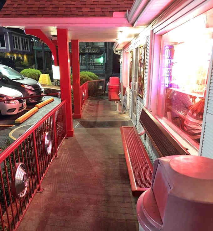 The patio seating offers front-row views to Branson's neon-lit strip, perfect for people-watching between bites of burger.