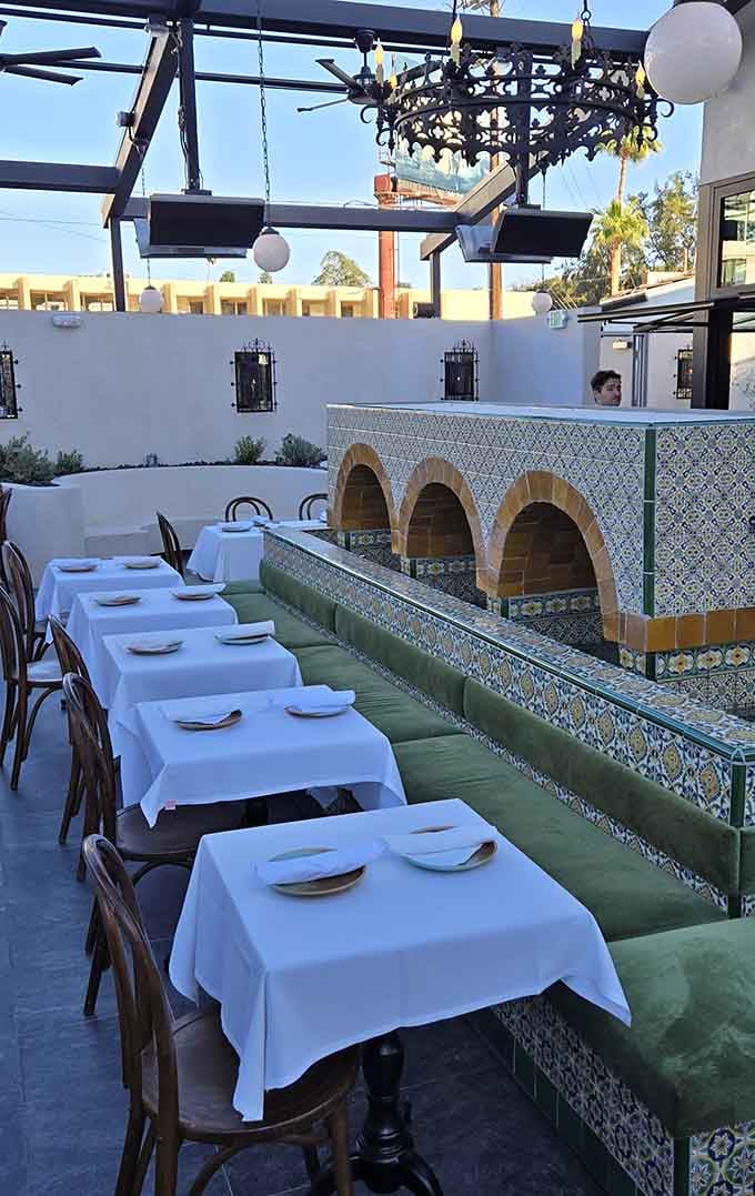 The patio offers California dreaming under the stars, complete with decorative tiles and that perfect evening breeze.