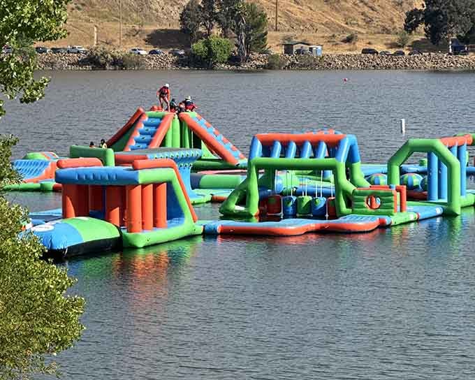 The inflatable water park brings out everyone's inner kid, turning a simple lake day into an aquatic adventure worthy of vacation photos.