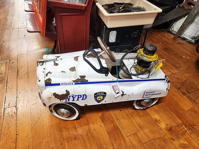This vintage NYPD pedal car has seen better days but still radiates charm that money simply cannot buy.