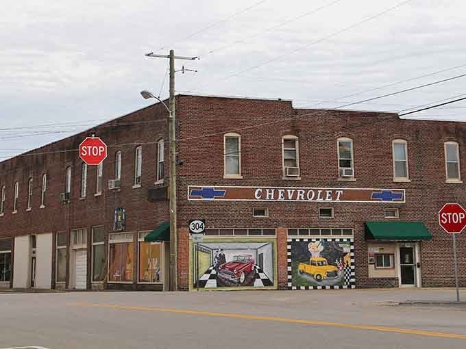 Vintage Chevrolet signage decorates brick buildings, celebrating automotive history in a town that remembers its industrial roots well.