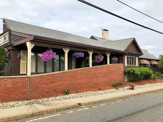 Hanging flower baskets and brick accents give this Route 1 landmark a welcoming presence that draws hungry travelers inside.