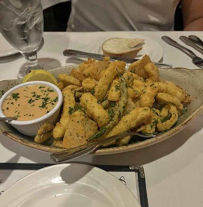 Golden fried calamari with that signature dipping sauce &ndash; the appetizer that starts every great Italian meal right.