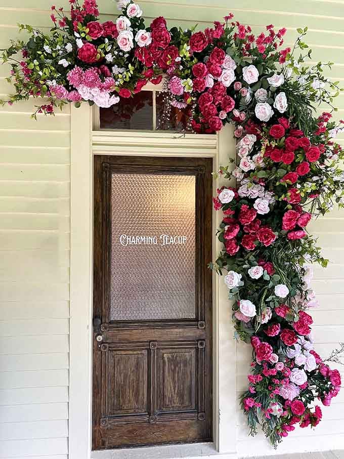 Even the entrance gets dressed up with cascading flowers, because first impressions matter when you're running a fairy tale.