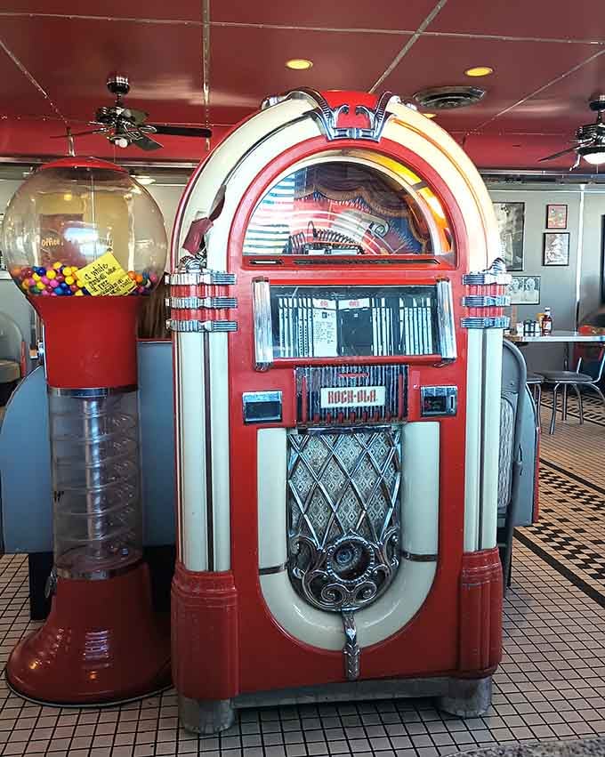 A classic jukebox stands ready to provide the soundtrack to your meal, because great diners need great tunes.