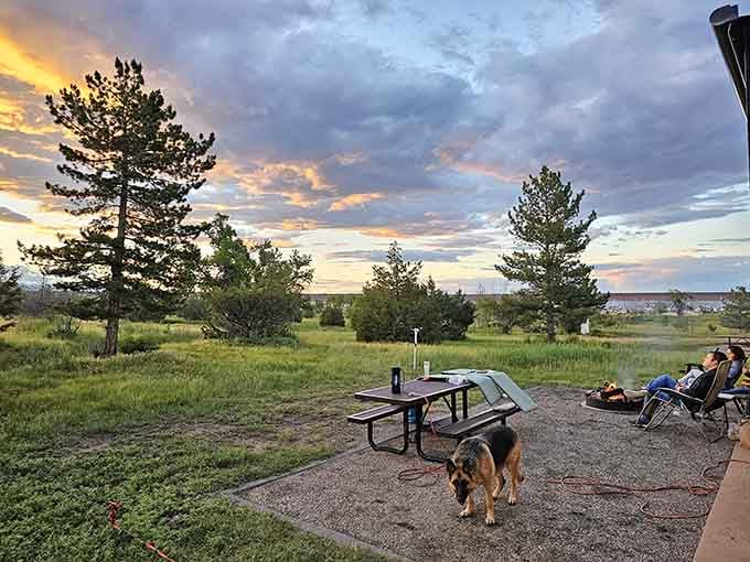 Evening campfires and loyal companions make for memories that outlast any vacation photo album ever could.
