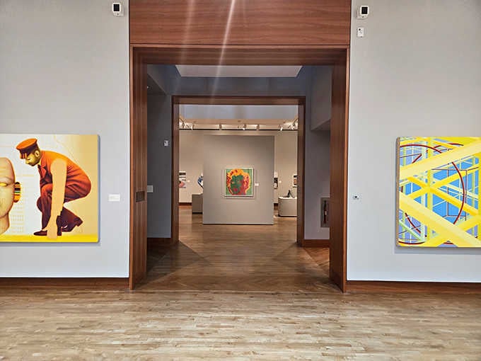 Gallery doorways frame distant masterpieces like Russian nesting dolls, each view revealing another layer of artistic discovery.