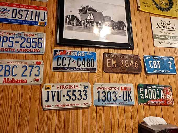 A wall full of license plates tells the story of countless road trips that ended deliciously.