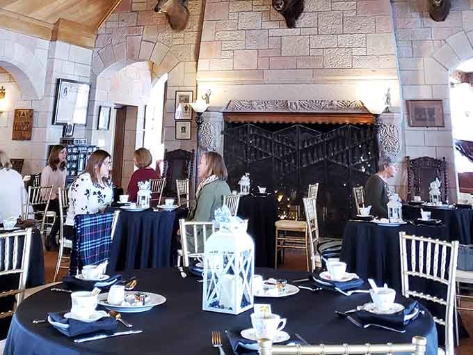 Guests gather beneath mounted bison heads and chandeliers, because Colorado castles do things their way.