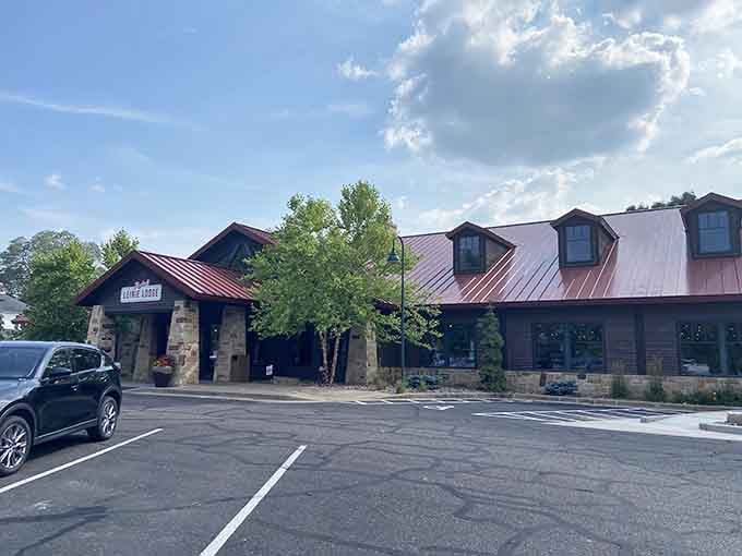 Leinie Lodge beckons with stone pillars and rustic charm, promising the kind of Wisconsin hospitality that comes with a cold one.