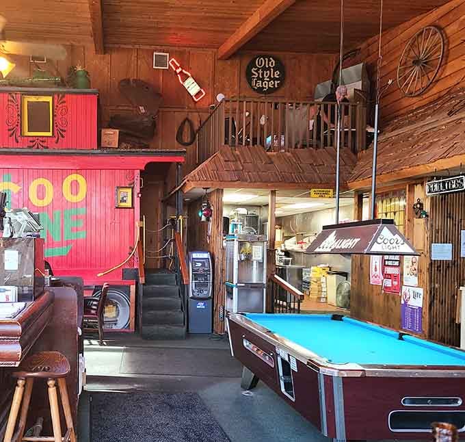 A pool table adds entertainment between courses, because eating in a train car apparently wasn't fun enough already.