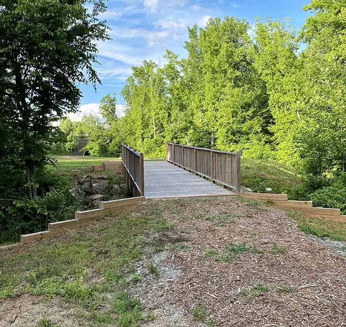 Millers Fork trail's wooden bridge leads adventurers into nature without leaving town limits, a perfect afternoon escape.