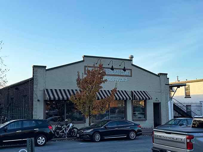 Flat Branch Pub sits waiting behind striped awnings, ready to pair house-brewed beer with serious comfort food done right.