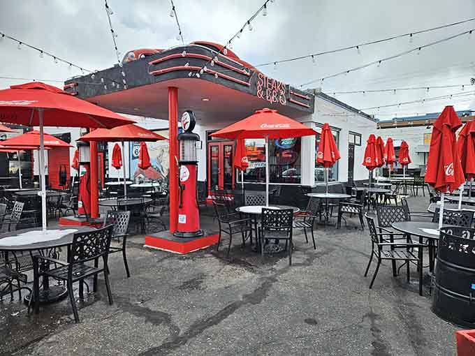 The outdoor patio where red umbrellas provide shade and that vintage gas pump provides all the atmosphere you need.