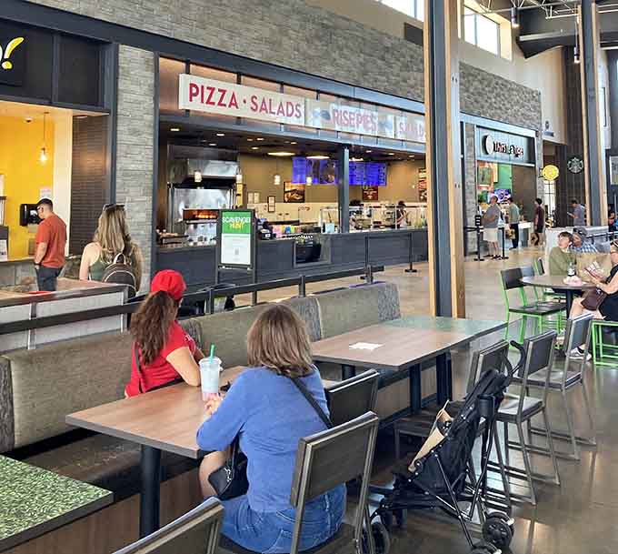 The food court offers refueling stations because shopping marathons require proper sustenance and rest stops.