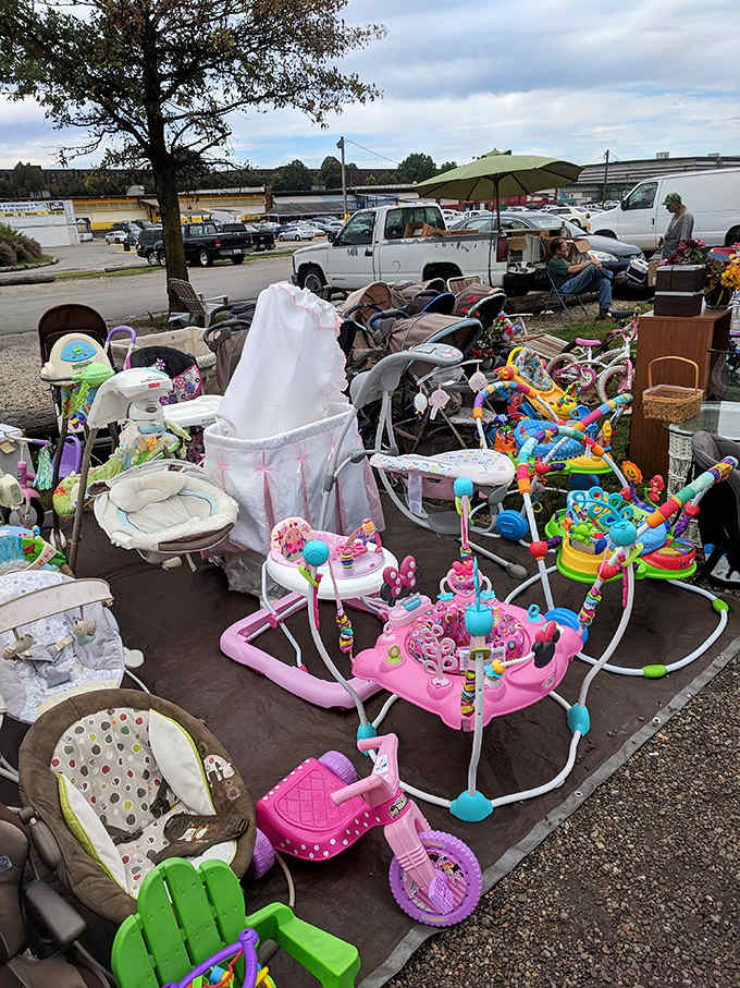 Baby gear and children's toys spread across the lot, helping young families stretch their budgets while their kids stretch their imaginations.