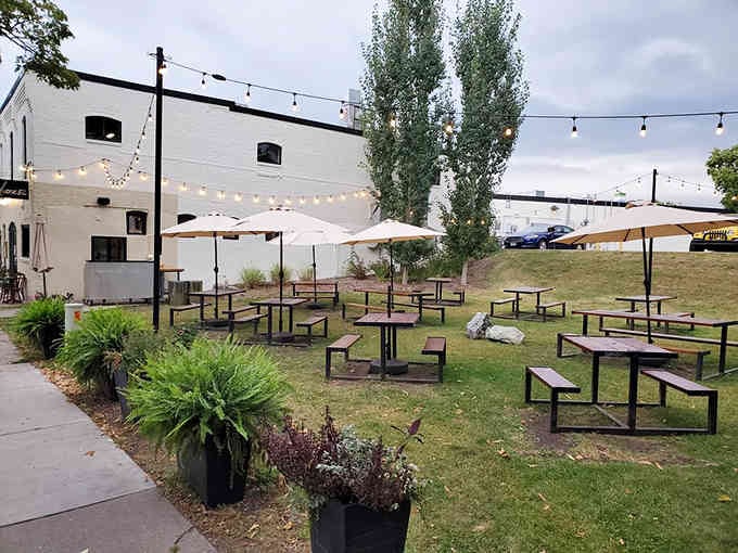 Outdoor seating with string lights transforms a simple meal into an al fresco experience worth savoring slowly.